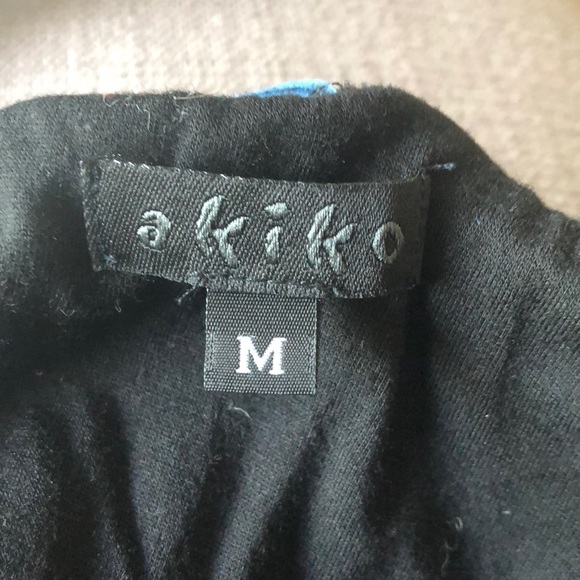 Akiko | Tops | Neimans Black Tank With Blue 0 Leather Straps | Poshmark